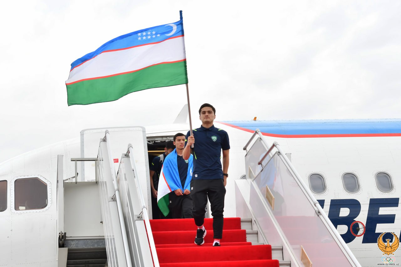 OCA » Uzbekistan's Paris-bound footballers enjoy open-top bus ride on ...